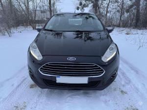 Black Ford Fiesta 2013 in Kaunas, with an engine capacity of 1.00 L and mileage of 140 thousand km for 3450 €, photo 7 on AUTOMOTO.COM.LV