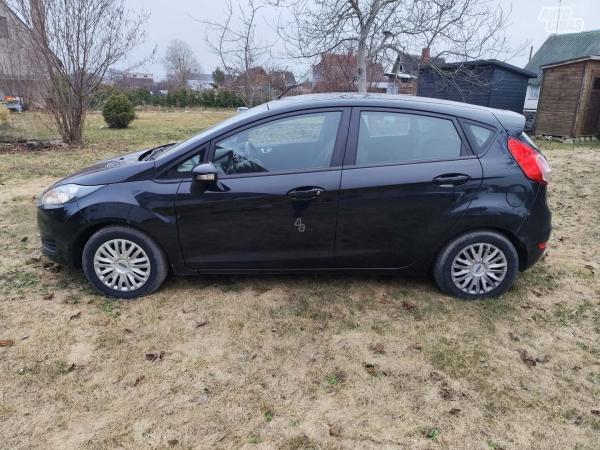 Black Ford Fiesta 2013 in Kaunas, with an engine capacity of 1.60 L and mileage of 245 thousand km for 2700 €, photo 1 on AUTOMOTO.COM.LV
