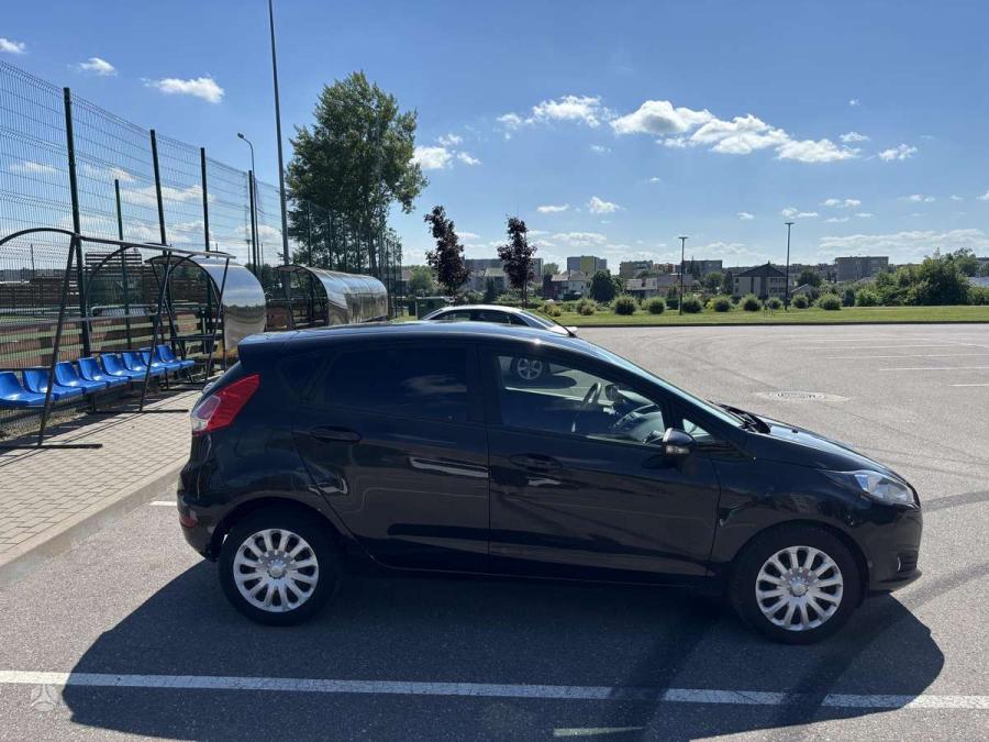 Black Ford Fiesta 2013 in Sirvintos, with an engine capacity of 1.50 L and mileage of 246 thousand km for 3400 €, photo 4 on AUTOMOTO.COM.LV