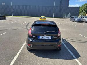 Black Ford Fiesta 2013 in Sirvintos, with an engine capacity of 1.50 L and mileage of 246 thousand km for 3400 €, photo 6 on AUTOMOTO.COM.LV