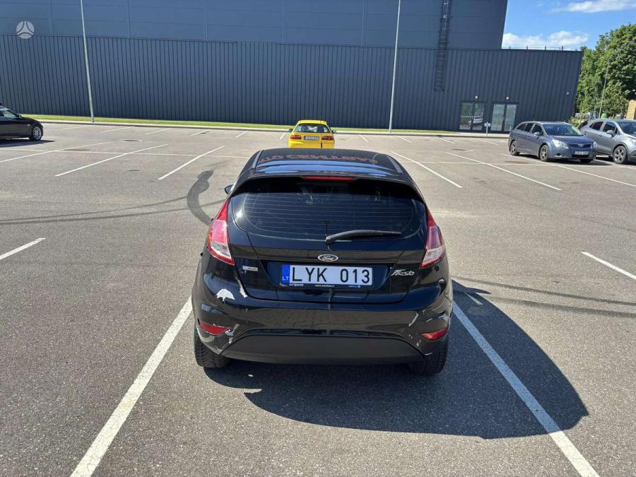 Black Ford Fiesta 2013 in Sirvintos, with an engine capacity of 1.50 L and mileage of 246 thousand km for 3400 €, photo 6 on AUTOMOTO.COM.LV