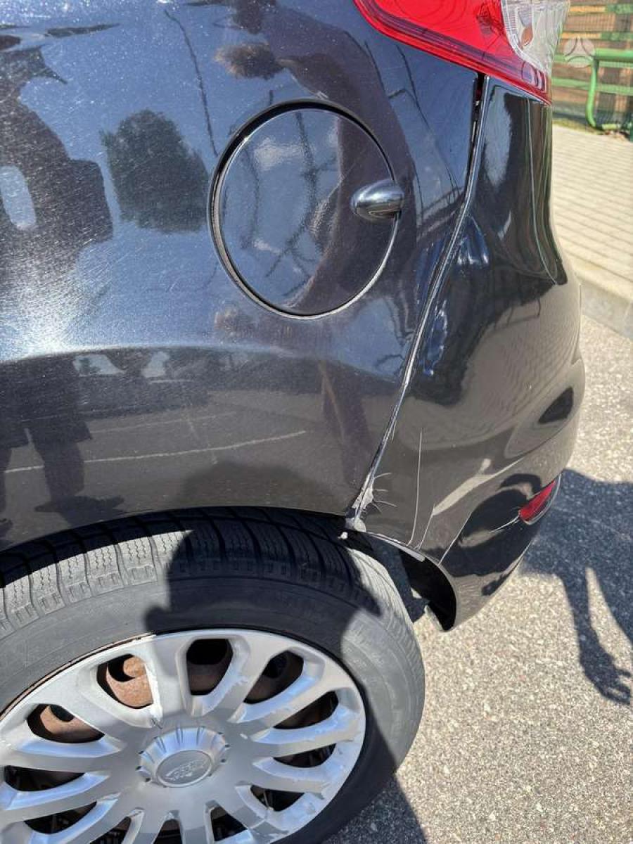 Black Ford Fiesta 2013 in Sirvintos, with an engine capacity of 1.50 L and mileage of 246 thousand km for 3400 €, photo 11 on AUTOMOTO.COM.LV