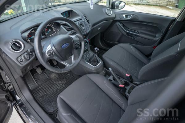 Black Ford Fiesta 2013 in Liepaja, with an engine capacity of 1.00 L and mileage of 190 thousand km for 4300 €, photo 9 on AUTOMOTO.COM.LV
