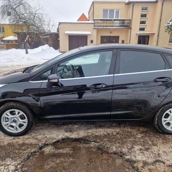 Black Ford Fiesta 2014 in Utena, with an engine capacity of 1.00 L and mileage of 220 thousand km for 4500 €, photo 4 on AUTOMOTO.COM.LV