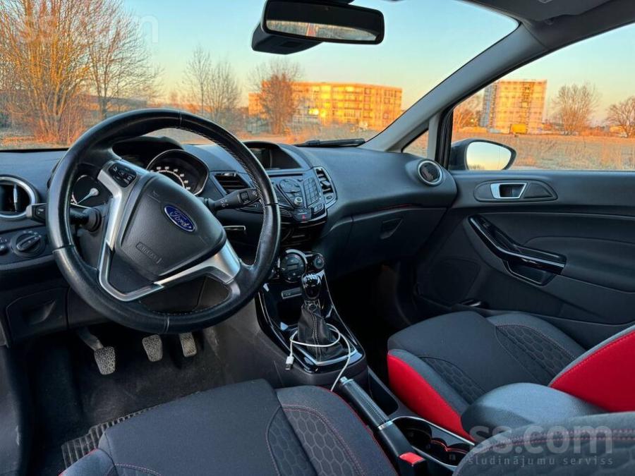 Black Ford Fiesta 2015 in Riga, with an engine capacity of 1.00 L and mileage of 130 thousand km for 5000 €, photo 12 on AUTOMOTO.COM.LV