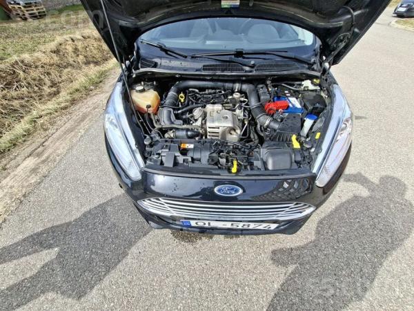 Black Ford Fiesta 2015 in Limbazi, with an engine capacity of 1.00 L and mileage of 115 thousand km for 3490 €, photo 8 on AUTOMOTO.COM.LV