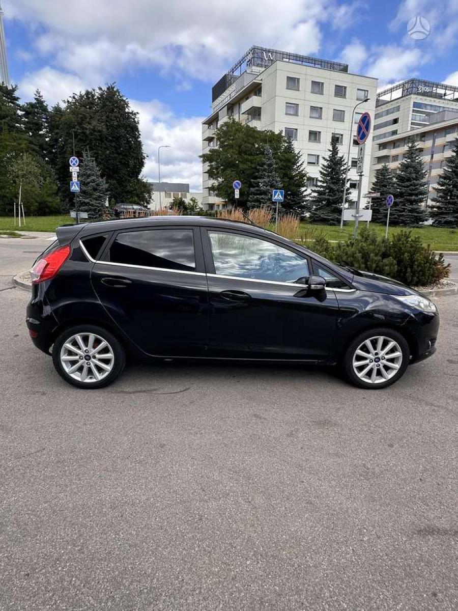 Black Ford Fiesta 2015 in Vilnius, with an engine capacity of 1.50 L and mileage of 262 thousand km for 2200 €, photo 4 on AUTOMOTO.COM.LV