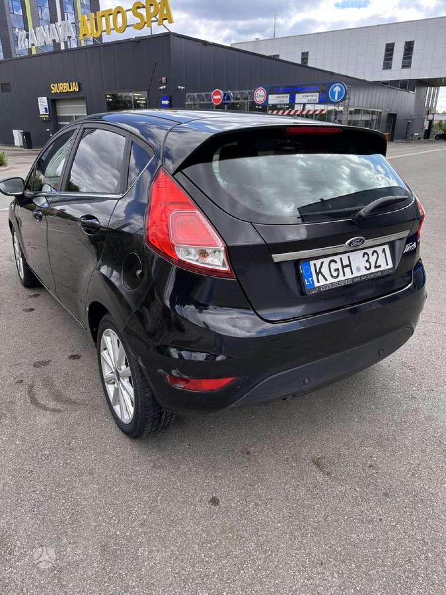 Black Ford Fiesta 2015 in Vilnius, with an engine capacity of 1.50 L and mileage of 262 thousand km for 2200 €, photo 5 on AUTOMOTO.COM.LV