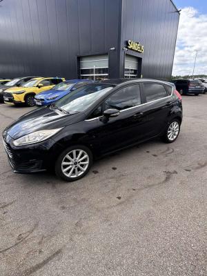 Black Ford Fiesta 2015 in Vilnius, with an engine capacity of 1.50 L and mileage of 262 thousand km for 2200 €, photo 9 on AUTOMOTO.COM.LV