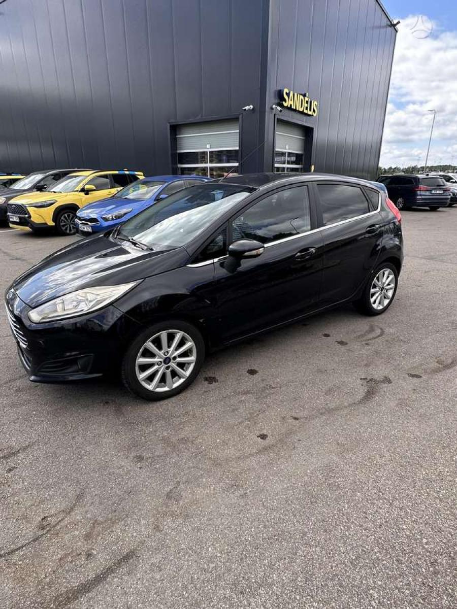 Black Ford Fiesta 2015 in Vilnius, with an engine capacity of 1.50 L and mileage of 262 thousand km for 2200 €, photo 9 on AUTOMOTO.COM.LV