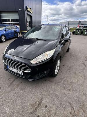 Black Ford Fiesta 2015 in Vilnius, with an engine capacity of 1.50 L and mileage of 262 thousand km for 2200 €, photo 10 on AUTOMOTO.COM.LV