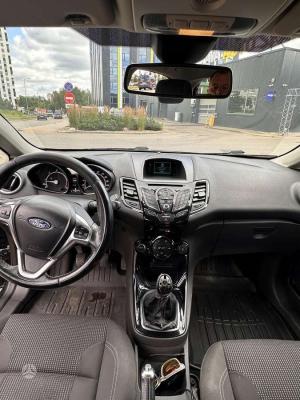 Black Ford Fiesta 2015 in Vilnius, with an engine capacity of 1.50 L and mileage of 262 thousand km for 2200 €, photo 12 on AUTOMOTO.COM.LV