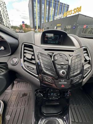Black Ford Fiesta 2015 in Vilnius, with an engine capacity of 1.50 L and mileage of 262 thousand km for 2200 €, photo 13 on AUTOMOTO.COM.LV