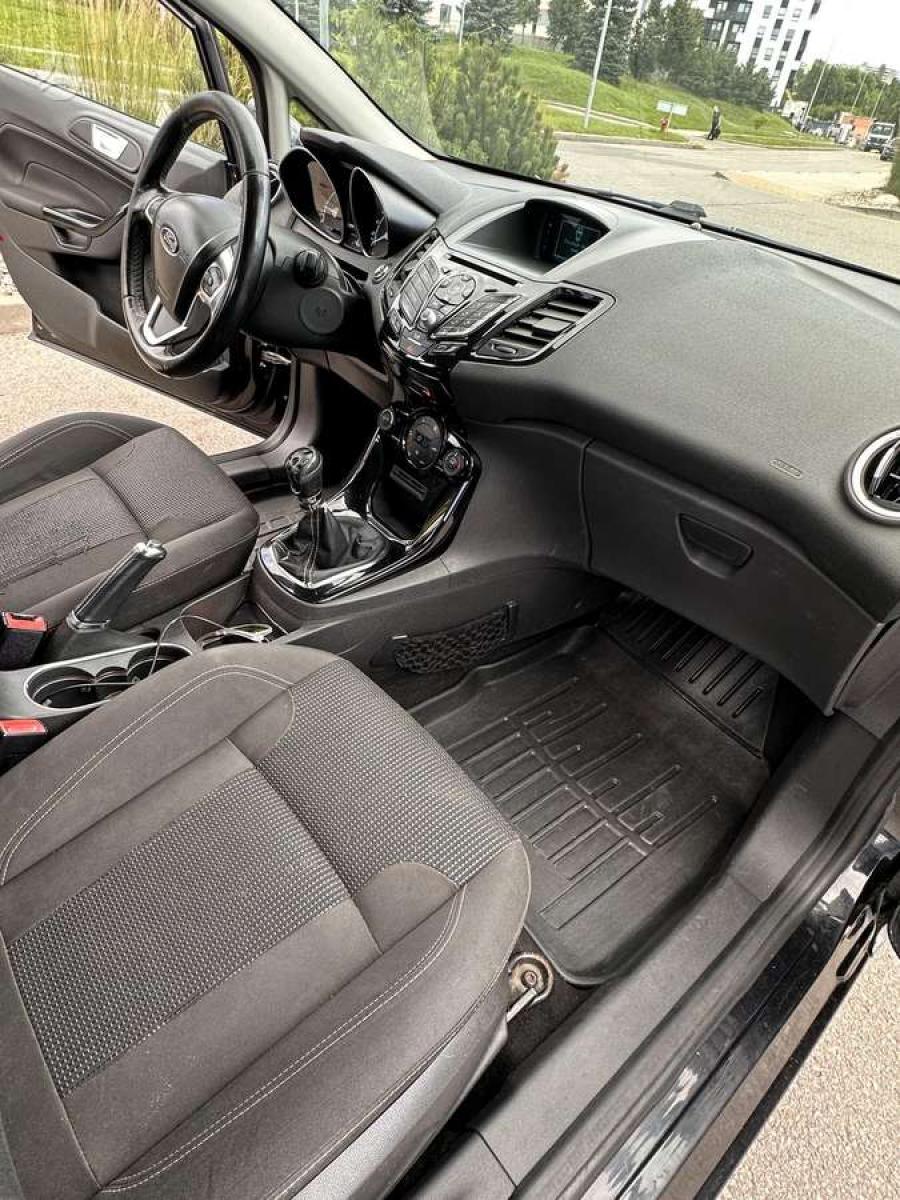Black Ford Fiesta 2015 in Vilnius, with an engine capacity of 1.50 L and mileage of 262 thousand km for 2200 €, photo 17 on AUTOMOTO.COM.LV
