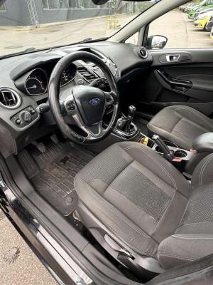 Black Ford Fiesta 2015 in Vilnius, with an engine capacity of 1.50 L and mileage of 262 thousand km for 2200 €, photo 18 on AUTOMOTO.COM.LV