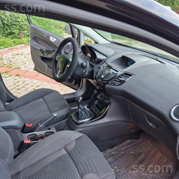 Black Ford Fiesta 2015 in Daugavpils, with an engine capacity of 1.00 L and mileage of 119 thousand km for 3950 €, photo 10 on AUTOMOTO.COM.LV