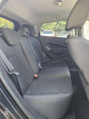 Black Ford Fiesta 2015 in Siauliai, with an engine capacity of 1.00 L and mileage of 228 thousand km for 5450 €, photo 16 on AUTOMOTO.COM.LV