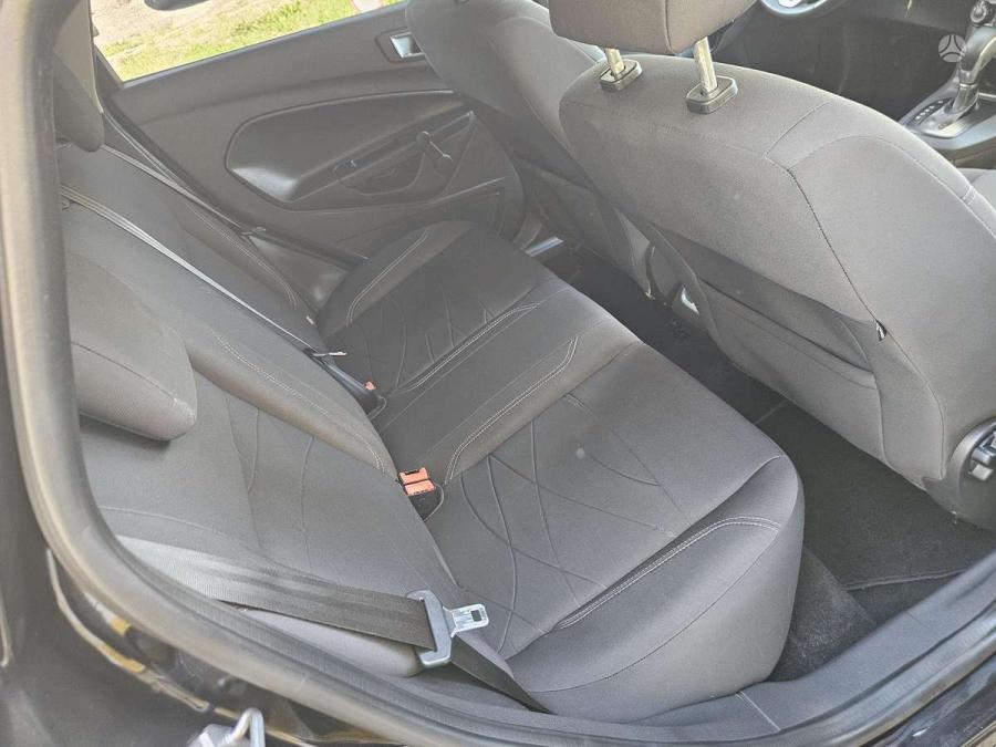 Black Ford Fiesta 2015 in Siauliai, with an engine capacity of 1.00 L and mileage of 228 thousand km for 5450 €, photo 17 on AUTOMOTO.COM.LV