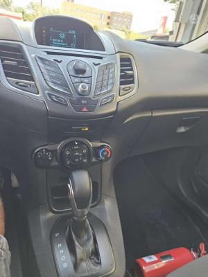 Black Ford Fiesta 2015 in Siauliai, with an engine capacity of 1.00 L and mileage of 228 thousand km for 5450 €, photo 20 on AUTOMOTO.COM.LV