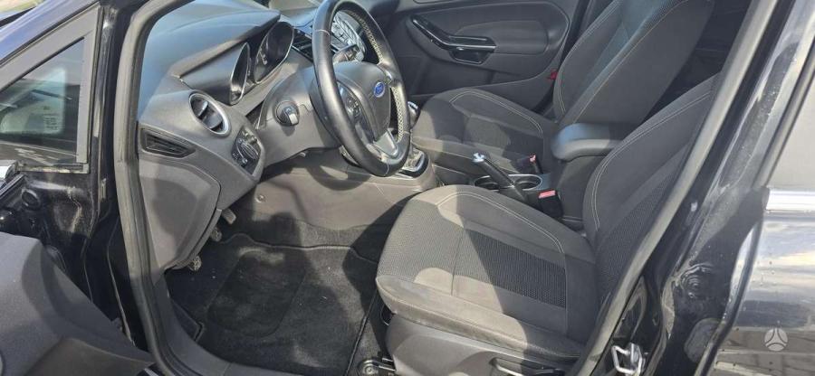 Black Ford Fiesta 2016 in Taurage, with an engine capacity of 1.00 L and mileage of 159 thousand km for 3550 €, photo 11 on AUTOMOTO.COM.LV