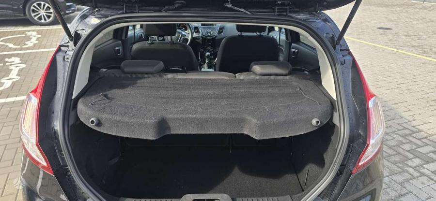 Black Ford Fiesta 2016 in Taurage, with an engine capacity of 1.00 L and mileage of 159 thousand km for 3550 €, photo 13 on AUTOMOTO.COM.LV