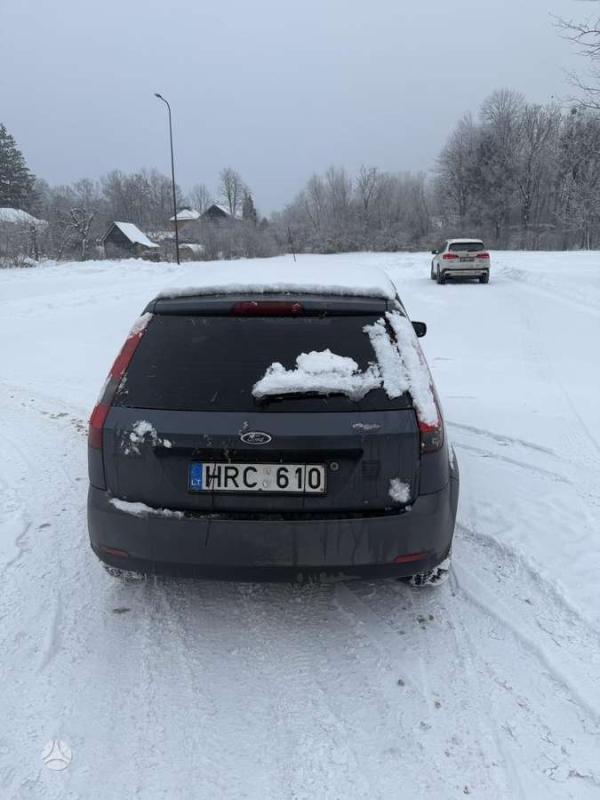 Blue Ford Fiesta 2004 in Kaunas, with an engine capacity of 1.39 L and mileage of 245 thousand km for 440 €, photo 7 on AUTOMOTO.COM.LV
