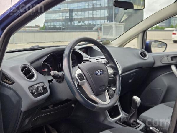 Blue Ford Fiesta 2009 in Riga, with an engine capacity of 1.20 L and mileage of 126 thousand km for 2750 €, photo 8 on AUTOMOTO.COM.LV