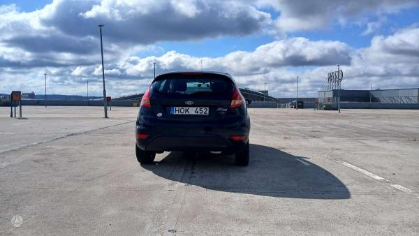 Blue Ford Fiesta 2010 in Vilnius, with an engine capacity of 1.40 L and mileage of 140 thousand km for 2750 €, photo 6 on AUTOMOTO.COM.LV