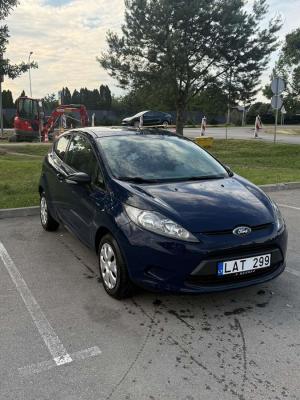 Blue Ford Fiesta 2011 in Kaunas, with an engine capacity of 1.40 L and mileage of 235 thousand km for 1800 €, photo  on AUTOMOTO.COM.LV