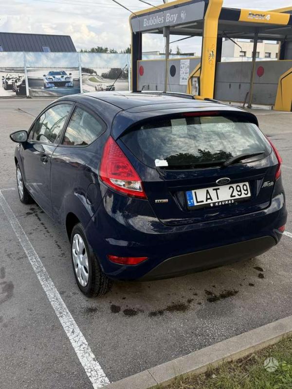 Blue Ford Fiesta 2011 in Kaunas, with an engine capacity of 1.40 L and mileage of 235 thousand km for 1800 €, photo 4 on AUTOMOTO.COM.LV