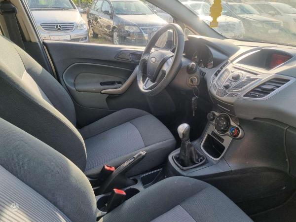 Blue Ford Fiesta 2011 in Kaunas, with an engine capacity of 1.60 L and mileage of 270 thousand km for 1800 €, photo 10 on AUTOMOTO.COM.LV