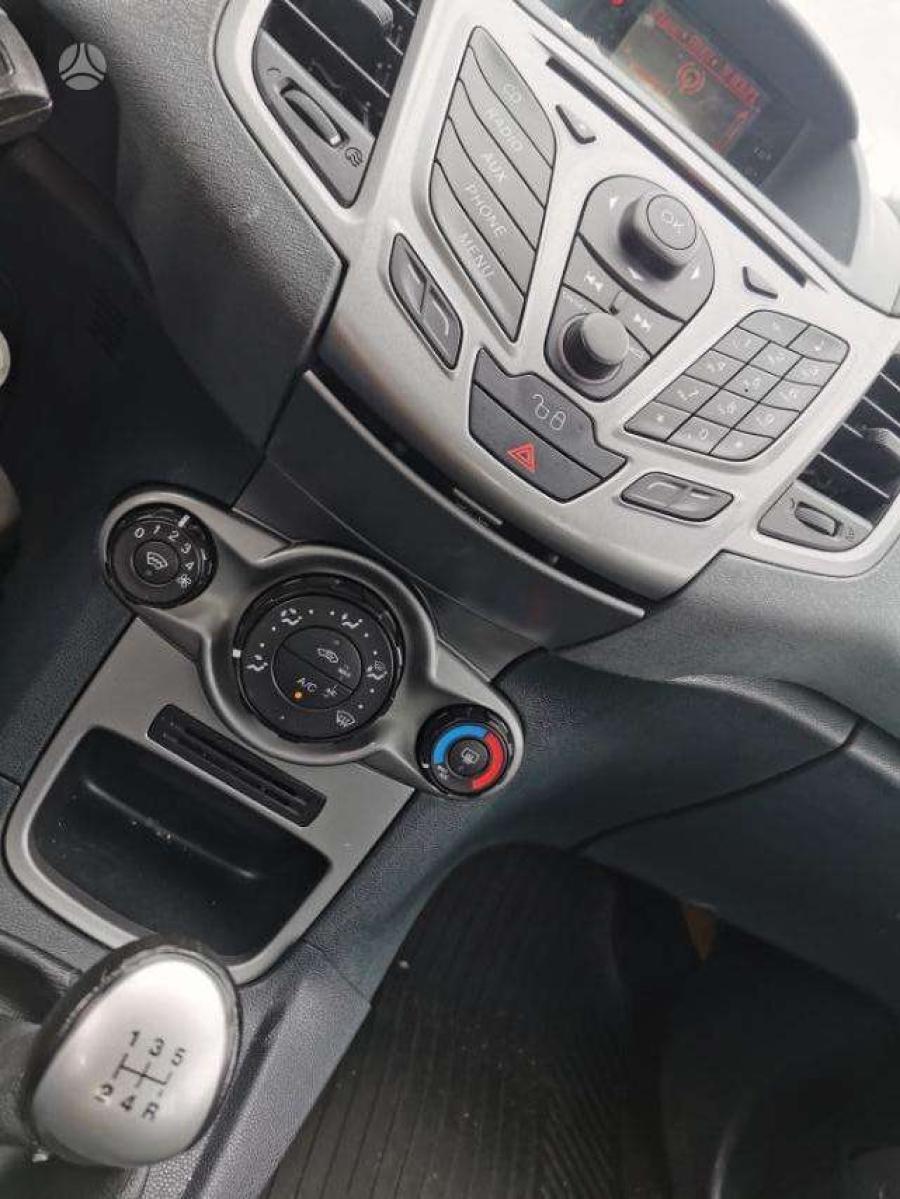 Blue Ford Fiesta 2011 in Vilnius, with an engine capacity of 1.56 L and mileage of 240 thousand km for 1590 €, photo 15 on AUTOMOTO.COM.LV