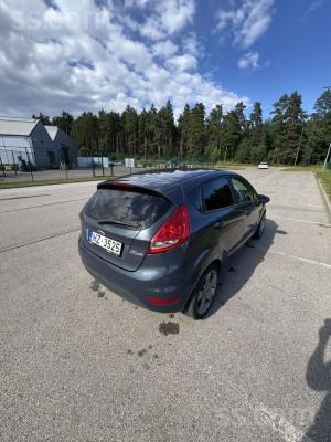 Blue Ford Fiesta 2012 in Riga, with an engine capacity of 1.20 L and mileage of 209 thousand km for 2500 €, photo 7 on AUTOMOTO.COM.LV