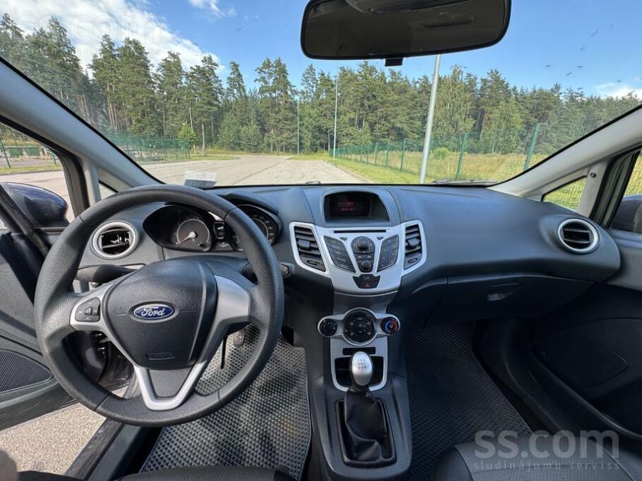 Blue Ford Fiesta 2012 in Riga, with an engine capacity of 1.20 L and mileage of 209 thousand km for 2500 €, photo 16 on AUTOMOTO.COM.LV