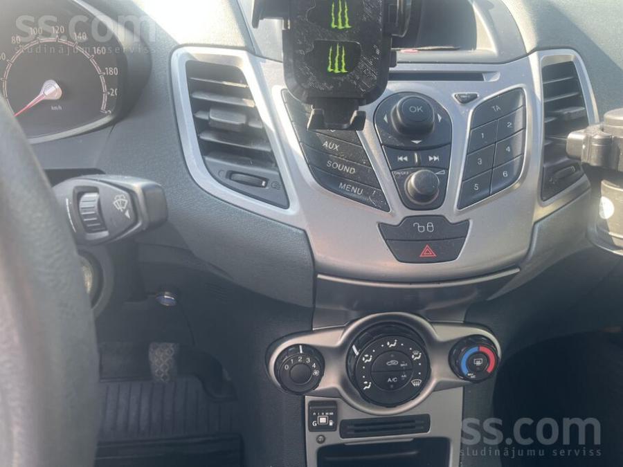 Blue Ford Fiesta 2012 in Riga, with an engine capacity of 1.30 L and mileage of 0 thousand km for 1490 €, photo 10 on AUTOMOTO.COM.LV