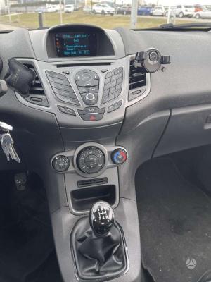 Blue Ford Fiesta 2015 in Vilnius, with an engine capacity of 1.24 L and mileage of 77 thousand km for 2600 €, photo 12 on AUTOMOTO.COM.LV