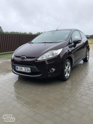 Brūns Ford Fiesta 2009 Viļņa, ar dzinēja tilpumu 1.60 L un nobraukumu 255 tūkst. km par 2390 €, foto  vietnē AUTOMOTO.COM.LV