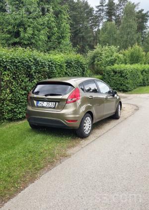 Brown Ford Fiesta 2012 in Riga, with an engine capacity of 1.20 L and mileage of 163 thousand km for 1850 €, photo 4 on AUTOMOTO.COM.LV