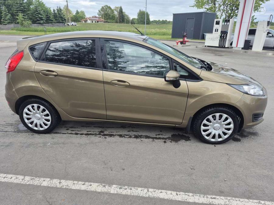 Brown Ford Fiesta 2013 in Plunge, with an engine capacity of 1.24 L and mileage of 189 thousand km for 3400 €, photo 4 on AUTOMOTO.COM.LV