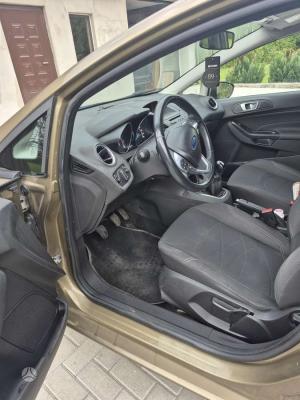 Brown Ford Fiesta 2013 in Plunge, with an engine capacity of 1.24 L and mileage of 189 thousand km for 3400 €, photo 7 on AUTOMOTO.COM.LV