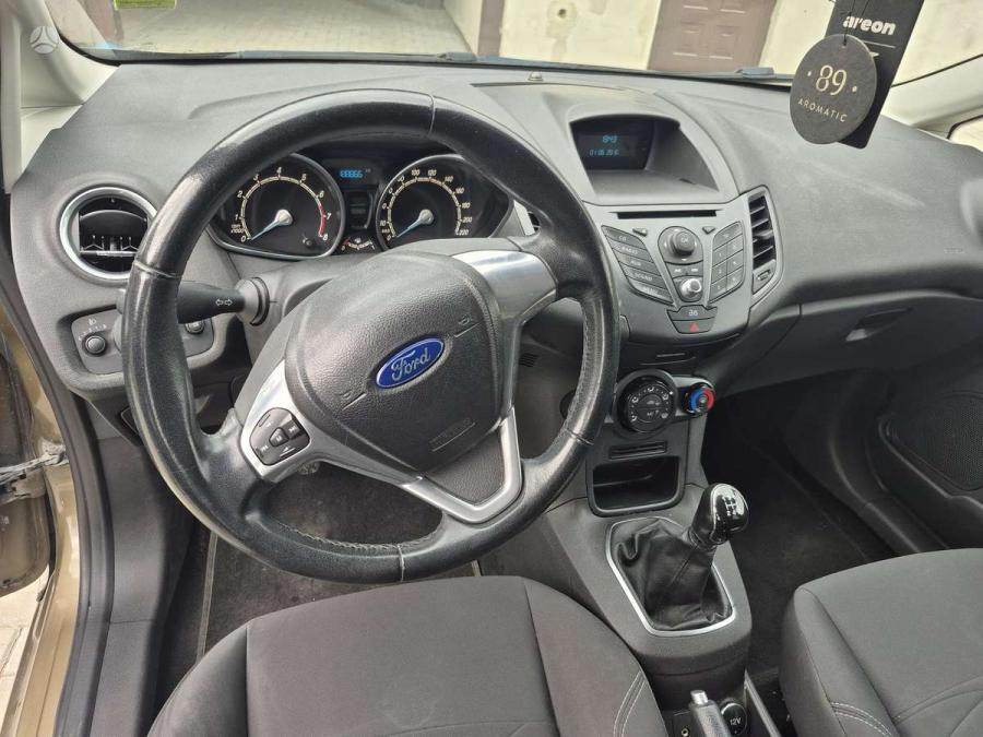Brown Ford Fiesta 2013 in Plunge, with an engine capacity of 1.24 L and mileage of 189 thousand km for 3400 €, photo 8 on AUTOMOTO.COM.LV