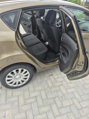 Brown Ford Fiesta 2013 in Plunge, with an engine capacity of 1.24 L and mileage of 189 thousand km for 3400 €, photo 9 on AUTOMOTO.COM.LV