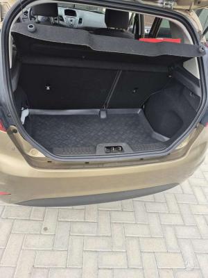 Brown Ford Fiesta 2013 in Plunge, with an engine capacity of 1.24 L and mileage of 189 thousand km for 3400 €, photo 11 on AUTOMOTO.COM.LV