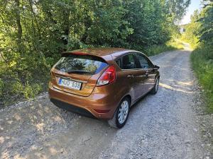 Brown Ford Fiesta 2015 in Vilnius, with an engine capacity of 1.00 L and mileage of 133 thousand km for 3500 €, photo 5 on AUTOMOTO.COM.LV