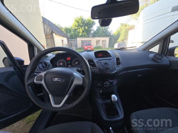 Pelēks Ford Fiesta 2012 Jēkabpils, ar dzinēja tilpumu 1.20 L un nobraukumu 352 tūkst. km par 1100 €, foto 10 vietnē AUTOMOTO.COM.LV