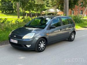 Pelēks Ford Fiesta 2004 Rīga, ar dzinēja tilpumu 1.40 L un nobraukumu 0 tūkst. km par 1490 €, foto  vietnē AUTOMOTO.COM.LV