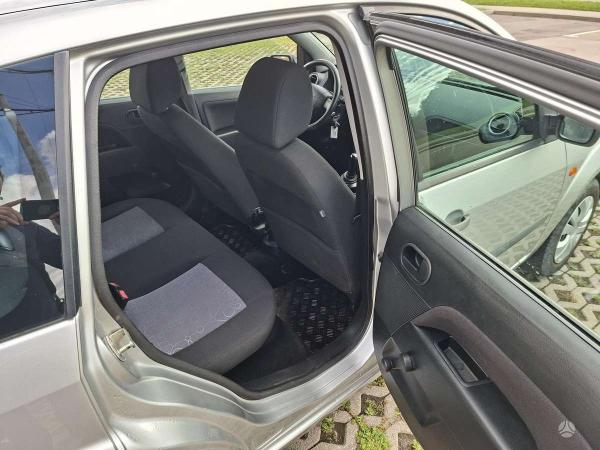 Grey Ford Fiesta 2007 in Siauliai, with an engine capacity of 1.40 L and mileage of 157 thousand km for 1450 €, photo 7 on AUTOMOTO.COM.LV