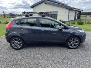 Grey Ford Fiesta 2009 in Vilnius, with an engine capacity of 1.40 L and mileage of 245 thousand km for 2300 €, photo  on AUTOMOTO.COM.LV