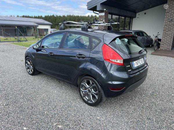 Grey Ford Fiesta 2009 in Vilnius, with an engine capacity of 1.40 L and mileage of 245 thousand km for 2300 €, photo 4 on AUTOMOTO.COM.LV