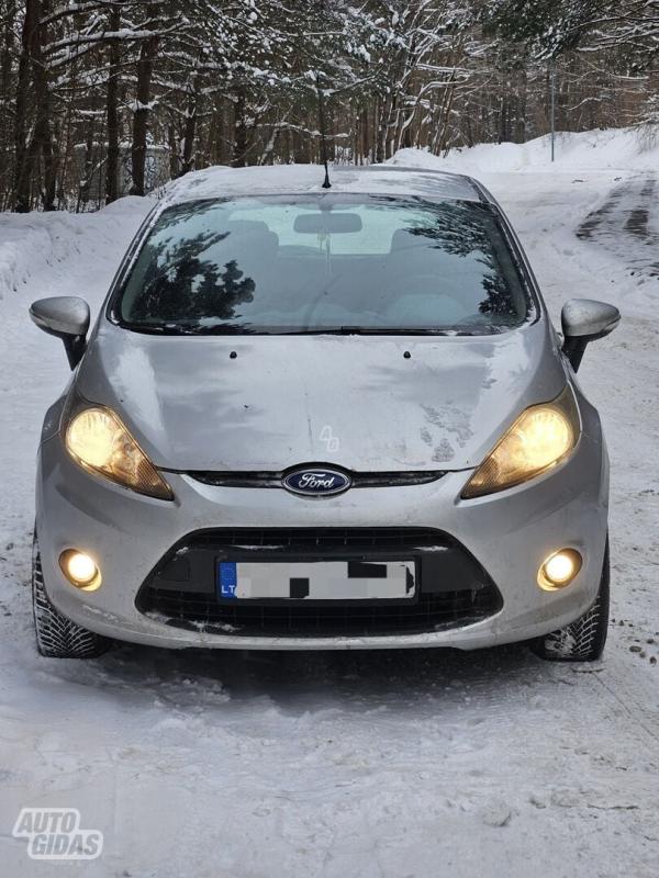 Grey Ford Fiesta 2010 in Vilnius, with an engine capacity of 1.40 L and mileage of 245 thousand km for 1600 €, photo 2 on AUTOMOTO.COM.LV